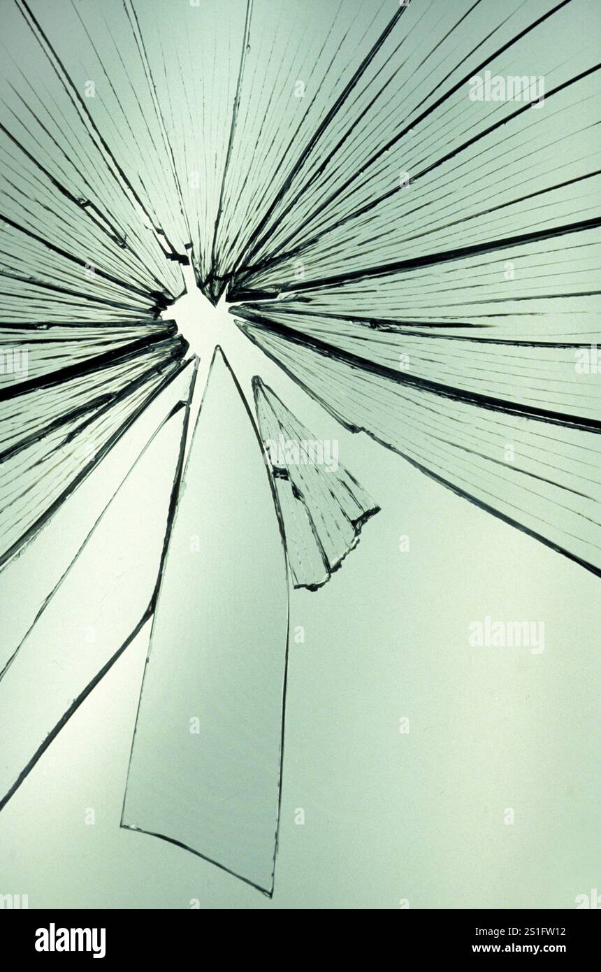 Glass fragments of a broken window pane Stock Photo - Alamy