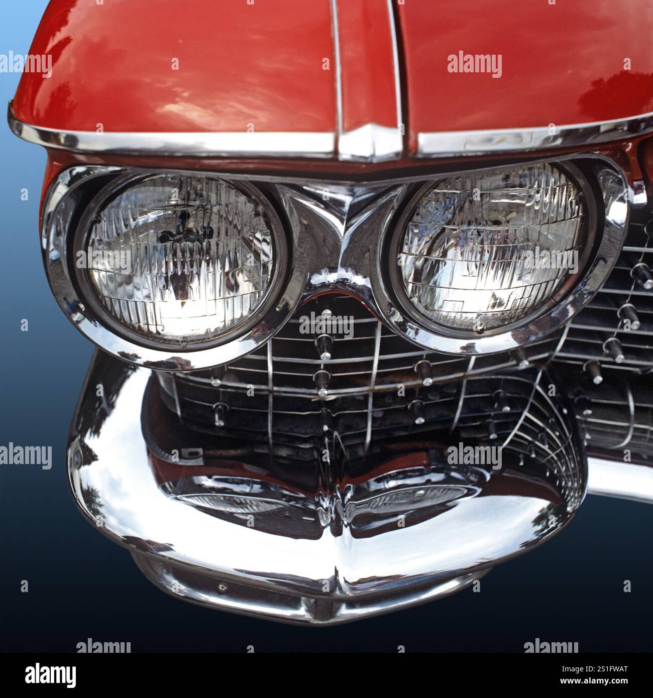 Close-up of twin headlights and bumper of an American road cruiser with ...