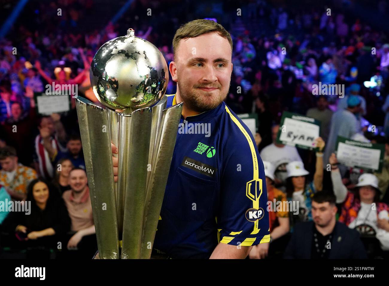 Luke Littler with The Sid Waddell Trophy after winning the Paddy Power ...