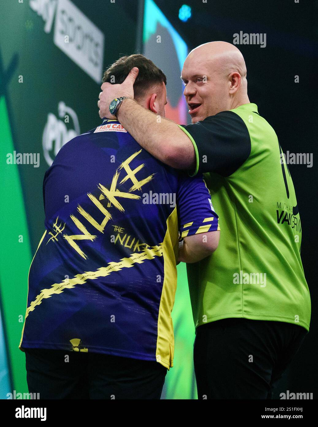 London, UK. 03rd Jan, 2025. Michael Van Gerwen congratulating Luke ...
