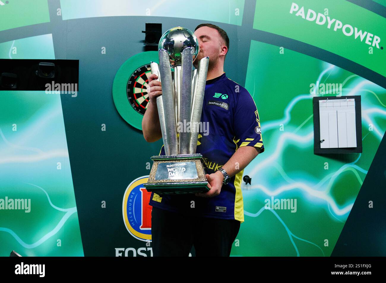London, UK. 03rd Jan, 2025. Luke Littler kissing the Paddy Power World ...