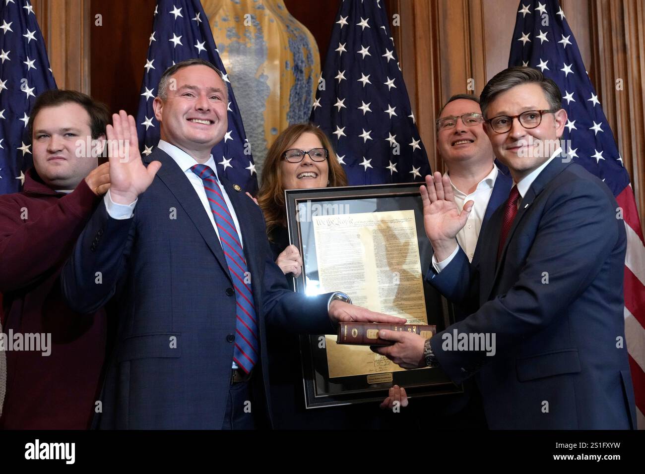 House Speaker Mike Johnson, R-La., right, poses during a ceremonial ...