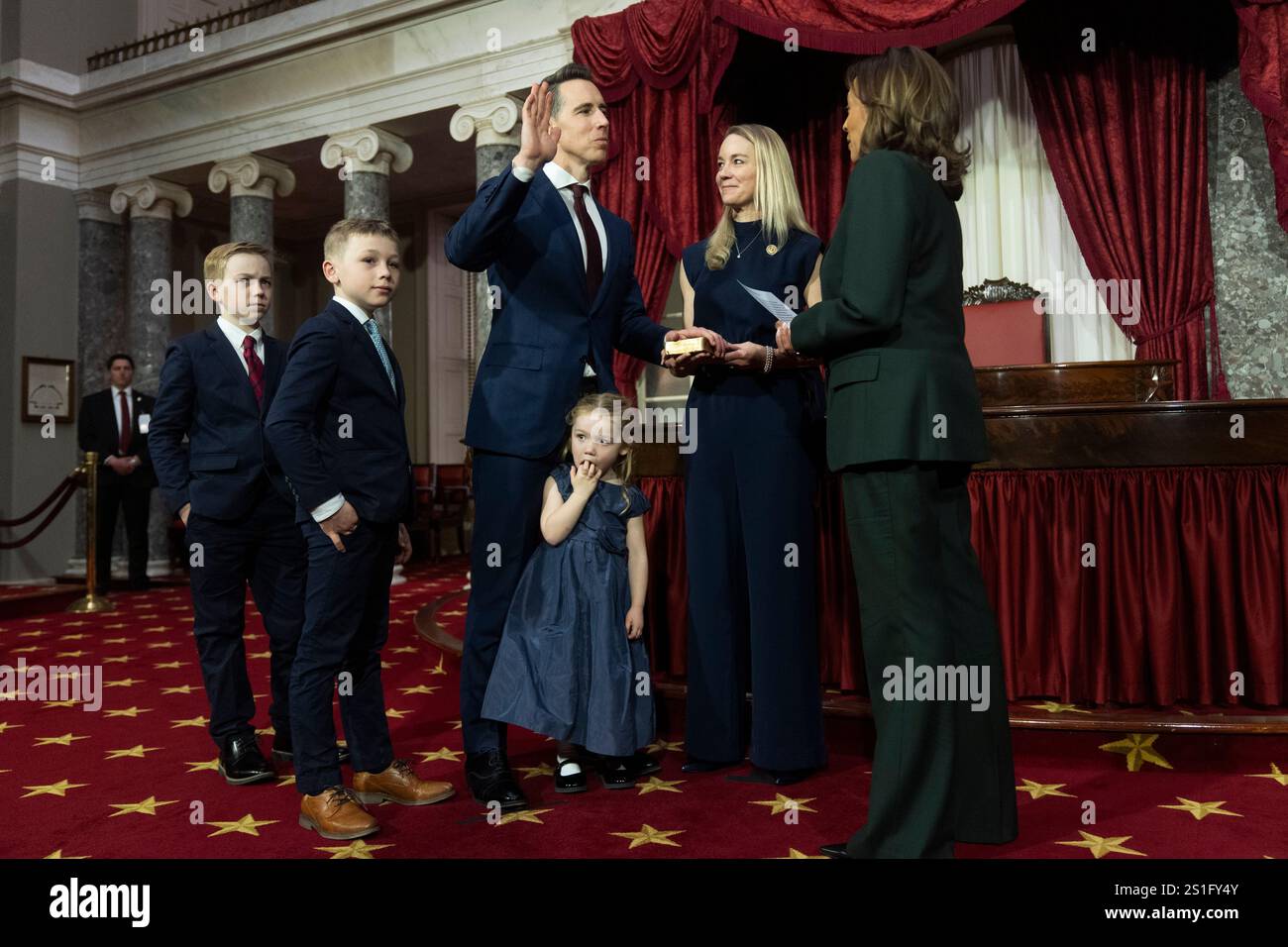 Sen. Josh Hawley, R-Mo., center, re-enacts being sworn in by Vice ...
