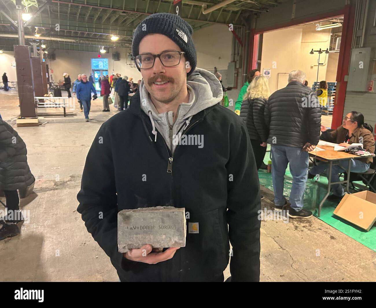 Calgary, Canada. 03rd Jan, 2025. Peter Soroka displays the brick his ...