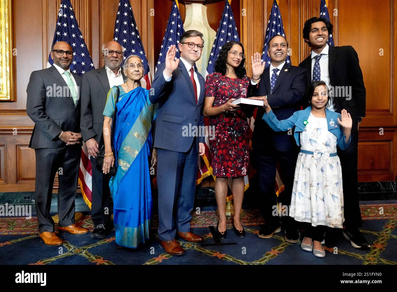 House Speaker Mike Johnson, R-La., fourth from left, poses during a ...