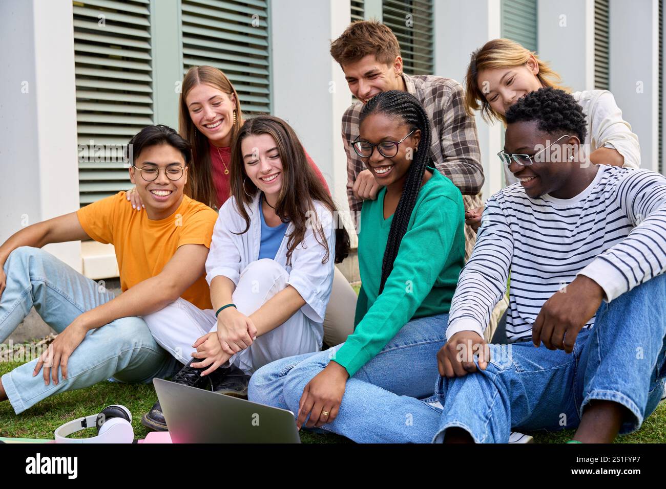 Group of young multiracial university students looking smiling at ...
