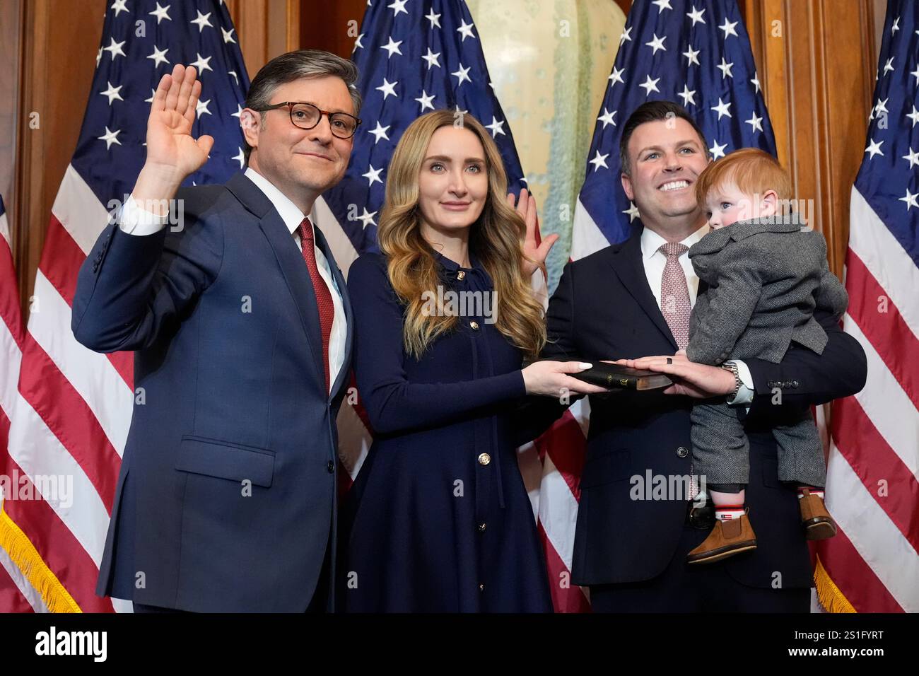 House Speaker Mike Johnson, R-La., left, poses during a ceremonial ...