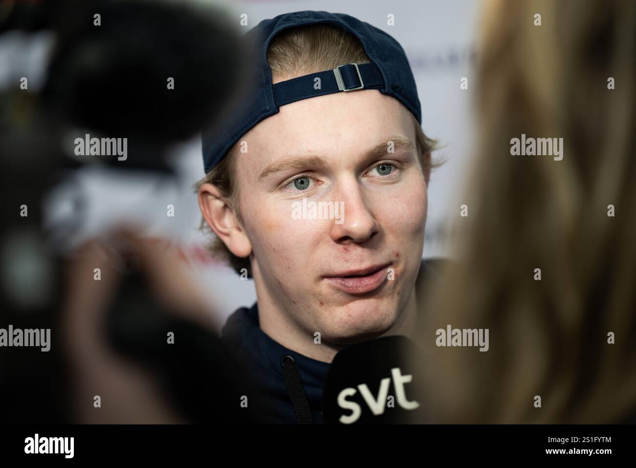 Otto Stenberg of, Sweden. , . is interviewed in the mixed zone after a ...