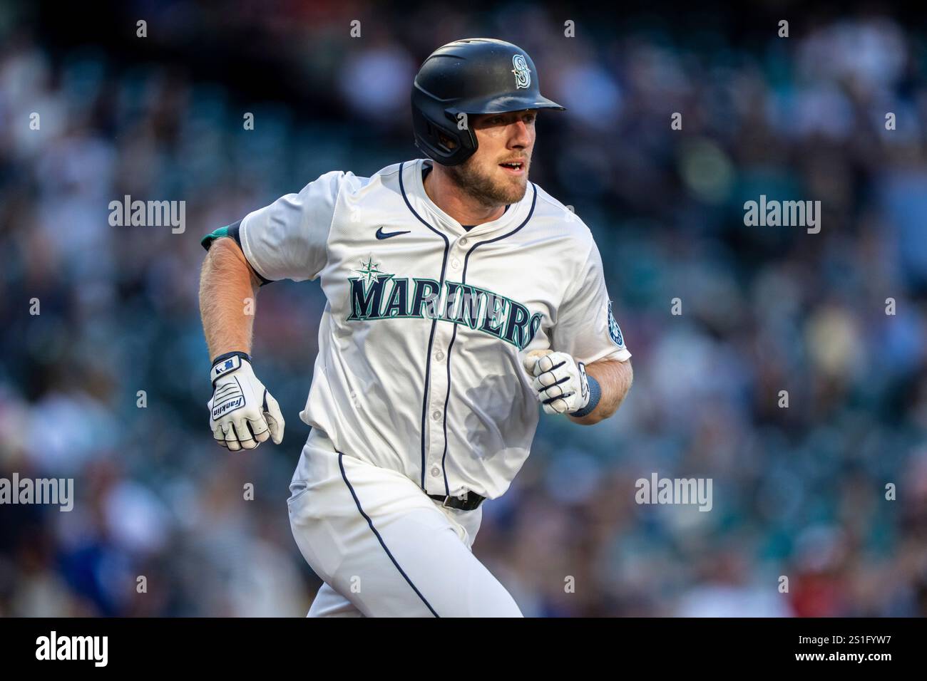 Seattle Mariners Luke Raley runs to first base during a baseball game ...