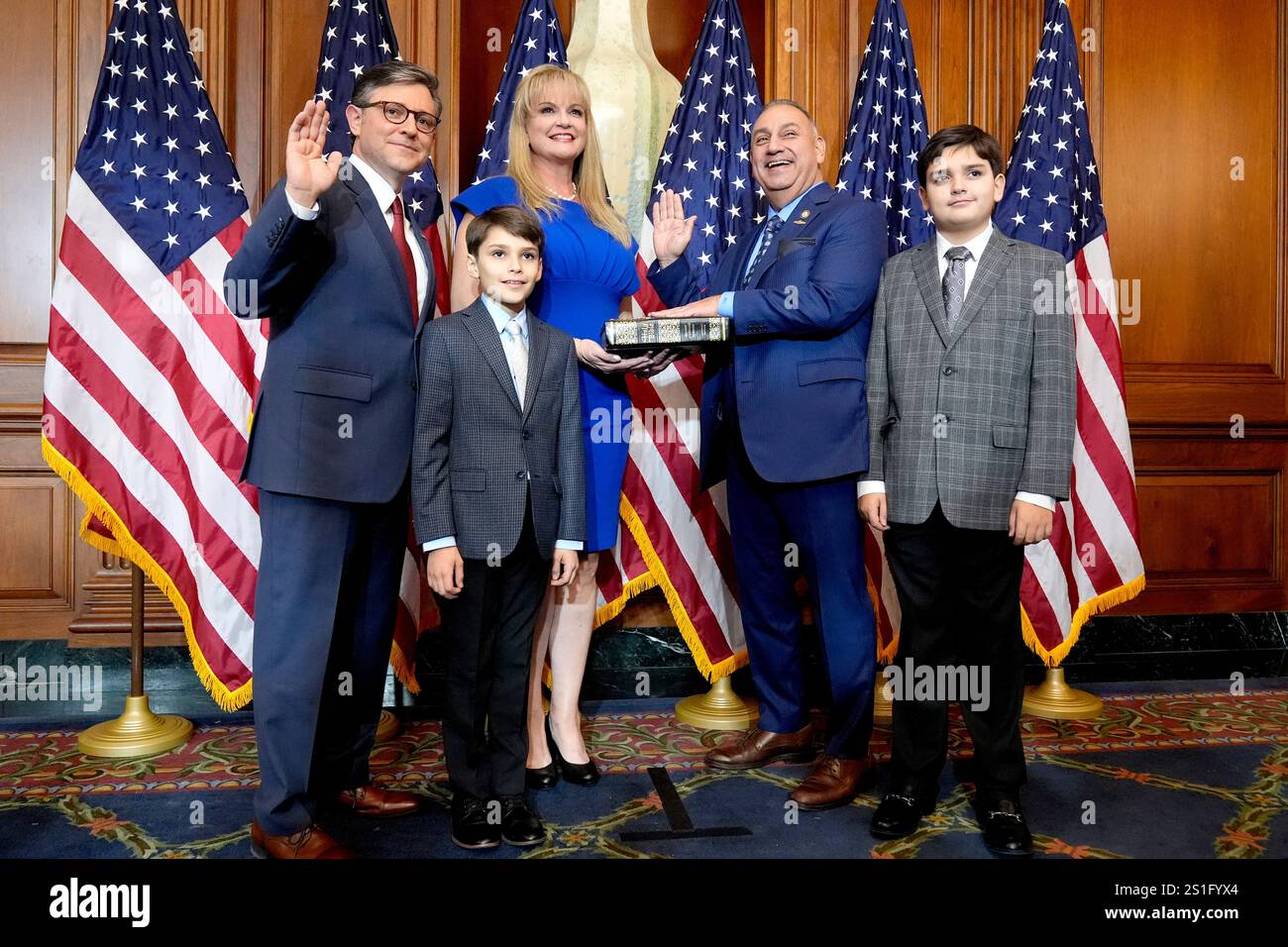 House Speaker Mike Johnson, R-La., left, poses during a ceremonial ...