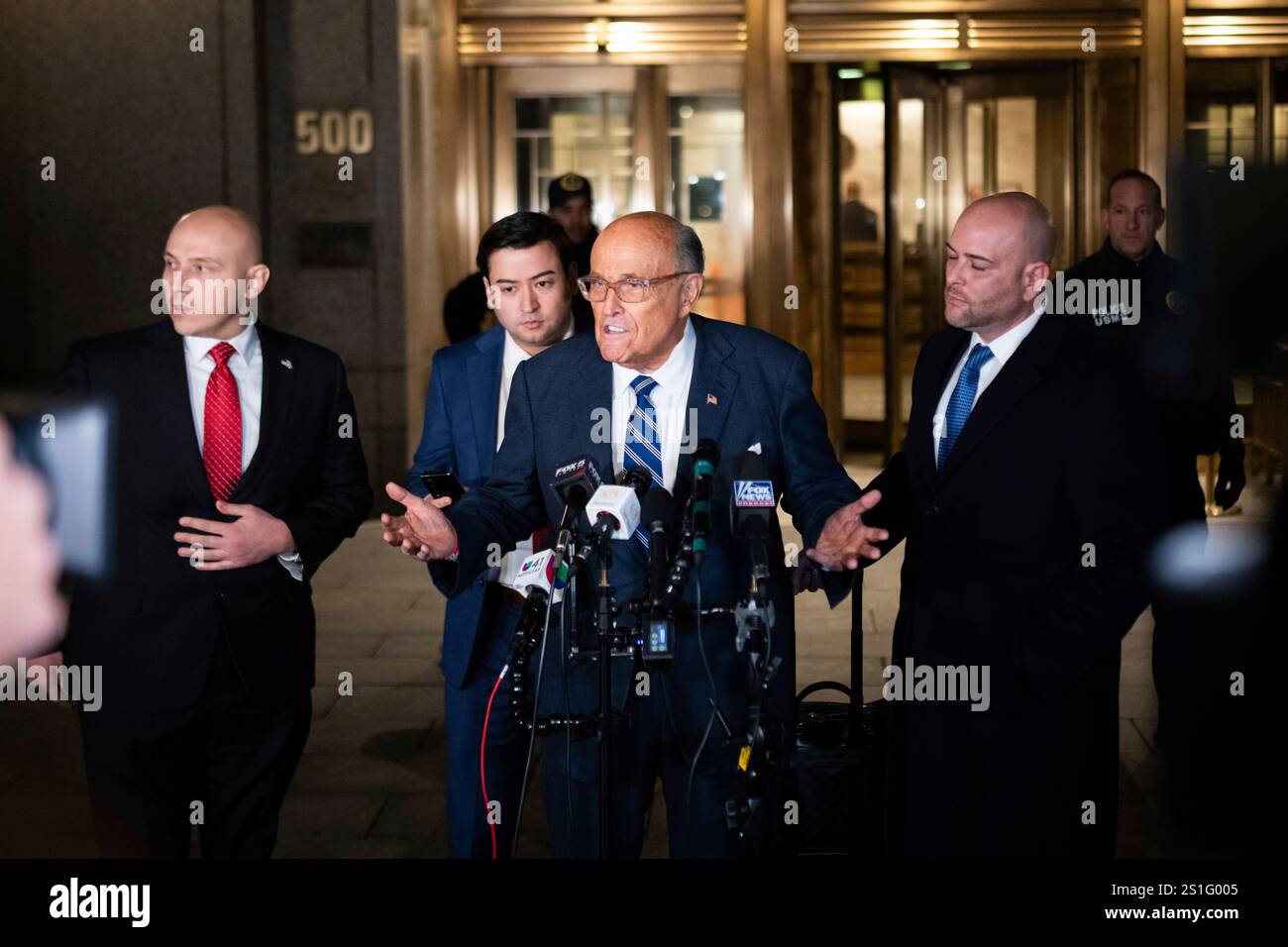 Rudy Giuliani speaks to the media outside of Manhattan federal court in ...