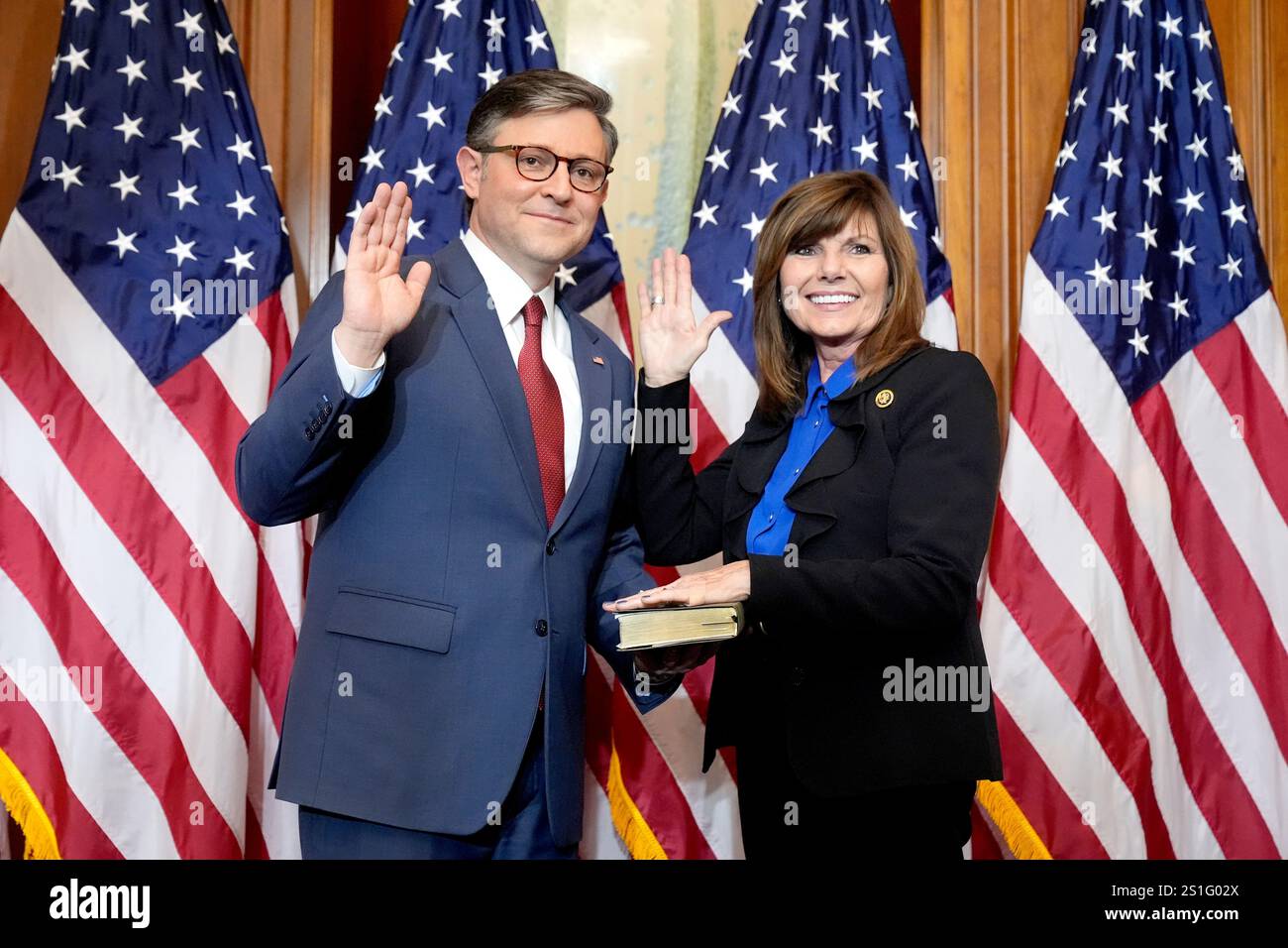 House Speaker Mike Johnson, R-La., left, poses during a ceremonial ...