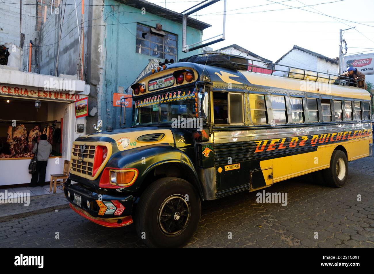 CHICHICASTENANGO, Guatemala — A colorful chicken bus navigates through ...