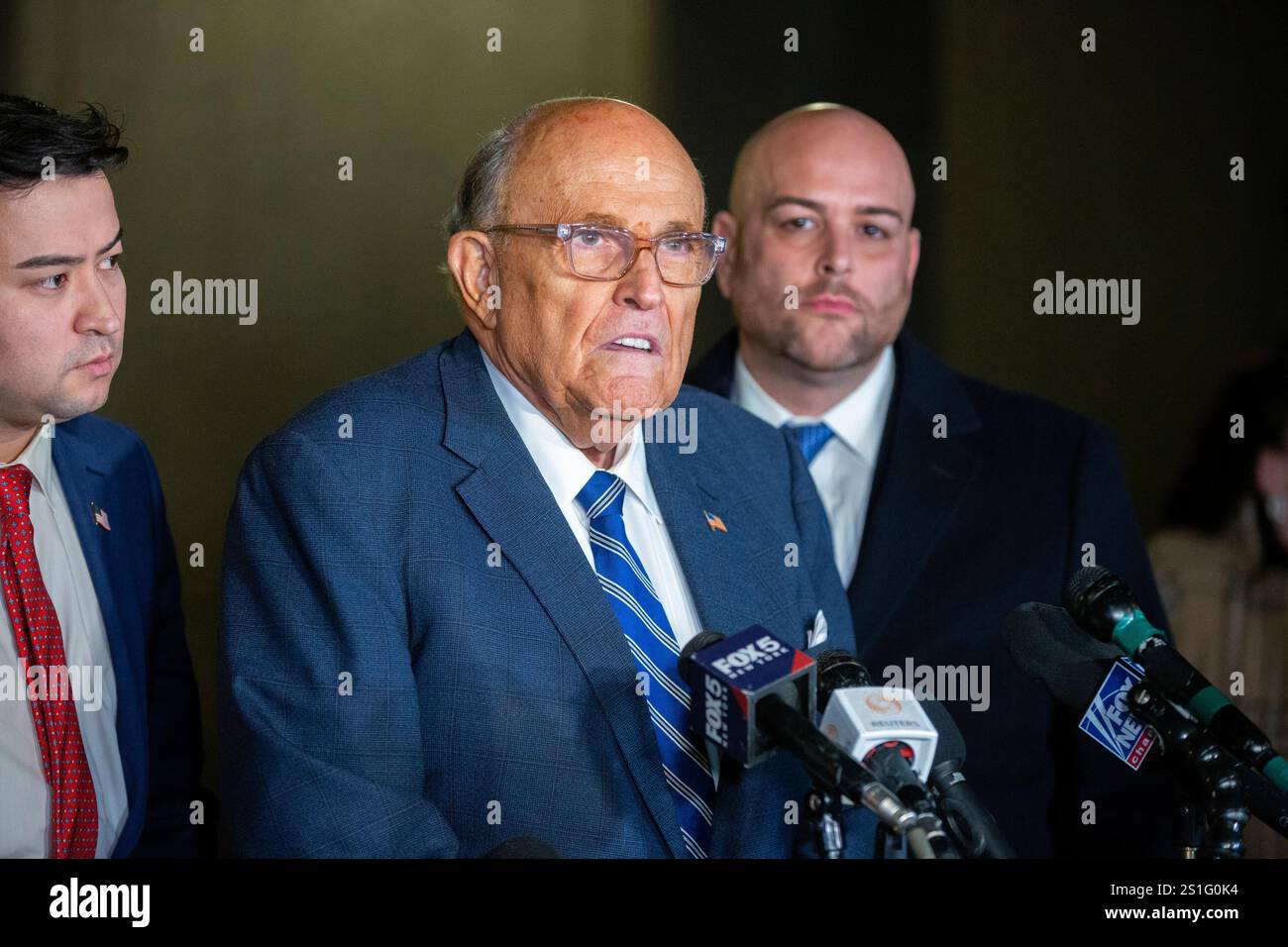 Rudy Giuliani speaks to the media outside of Manhattan federal court in ...
