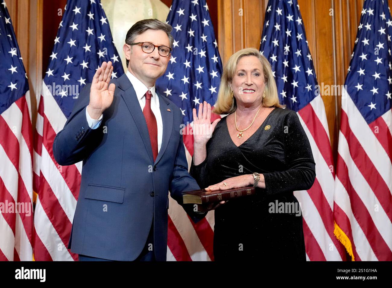 House Speaker Mike Johnson, R-La., left, poses during a ceremonial ...