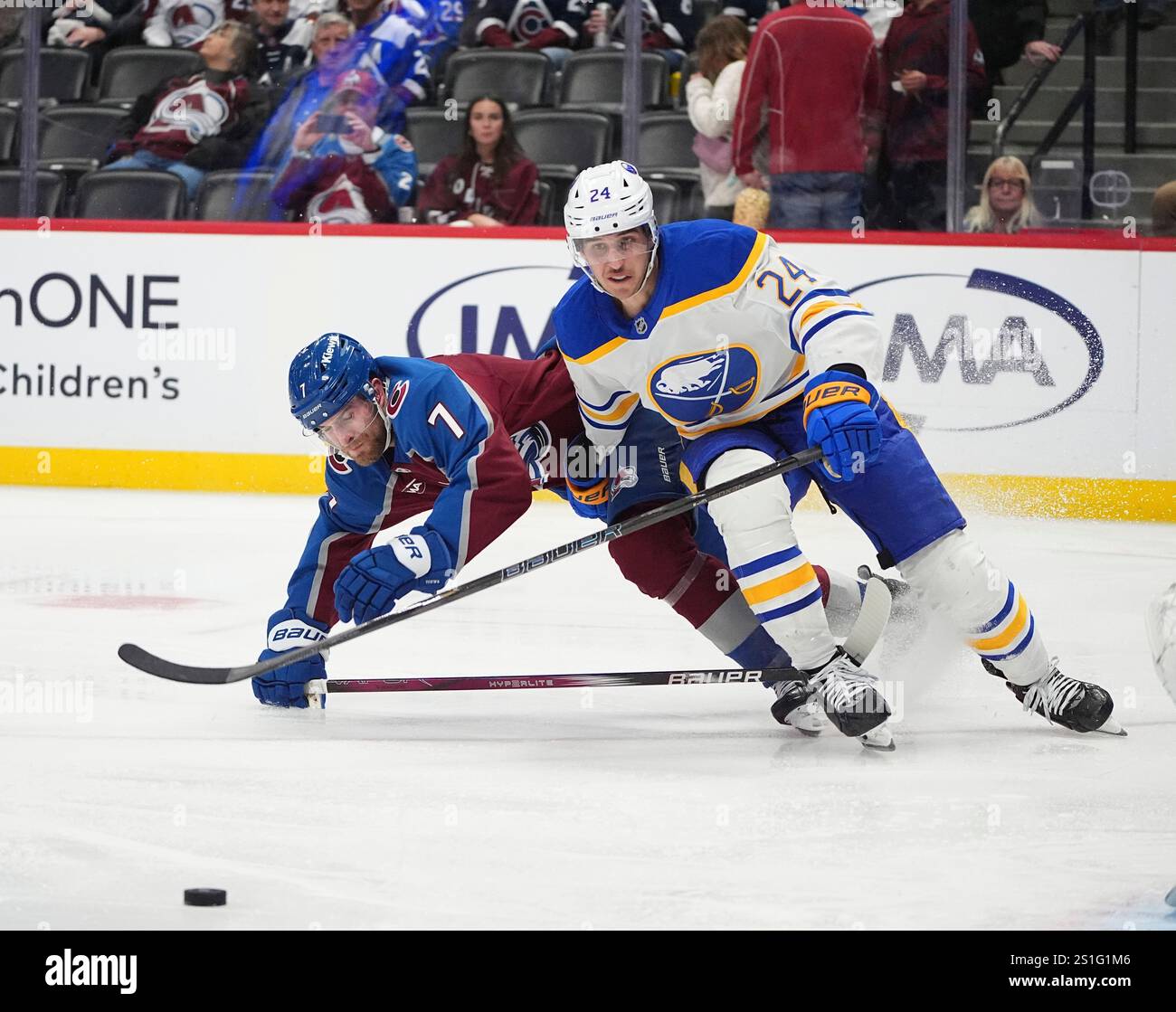 Colorado Avalanche defenseman Devon Toews (7) and Buffalo Sabres center ...