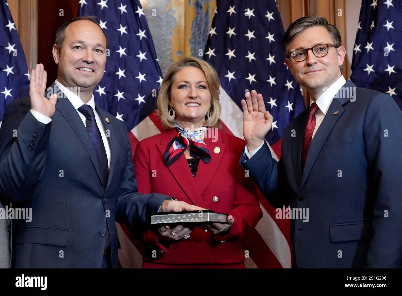 House Speaker Mike Johnson, R-La., right, poses during a ceremonial ...