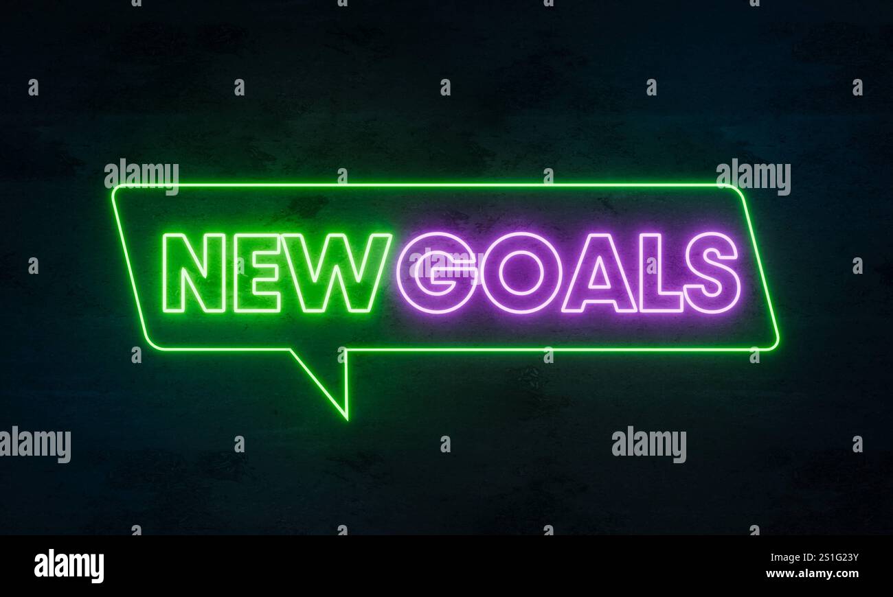 New goals. New goals. Illuminated neon sign in green and purple on a ...