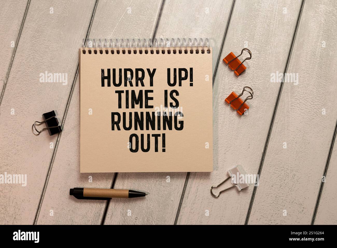 Time is running, text on notepad with clock on white background Stock ...