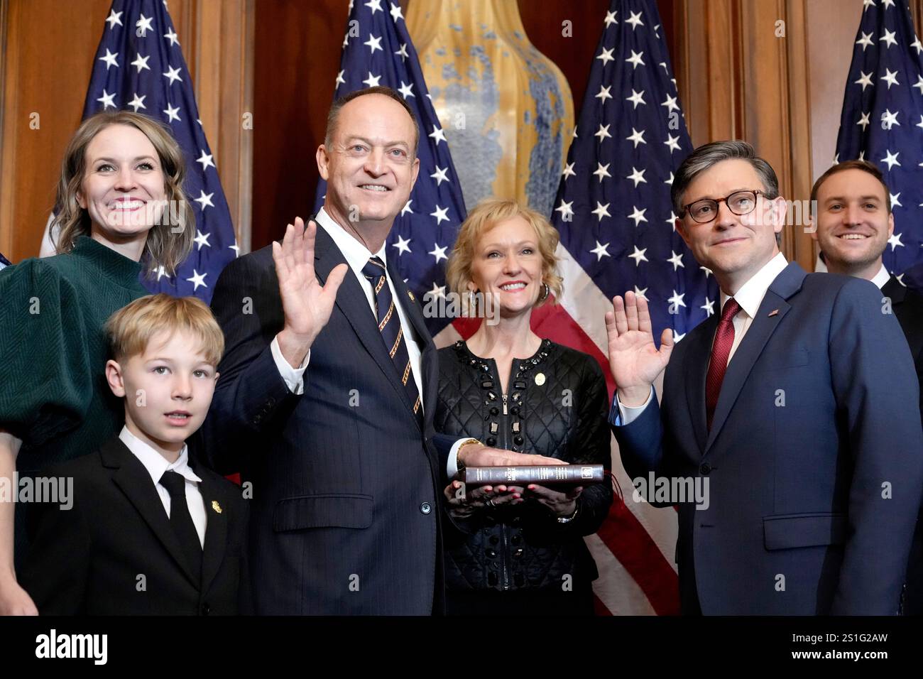 House Speaker Mike Johnson, R-La., second right, poses during a ...