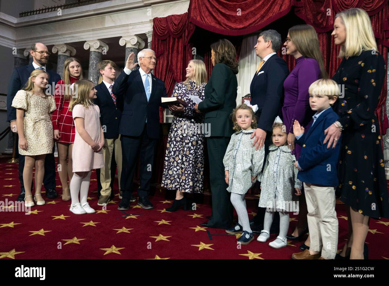 Sen. Roger Wicker, R-Ms., sixth from left, with his family, re-enacts ...