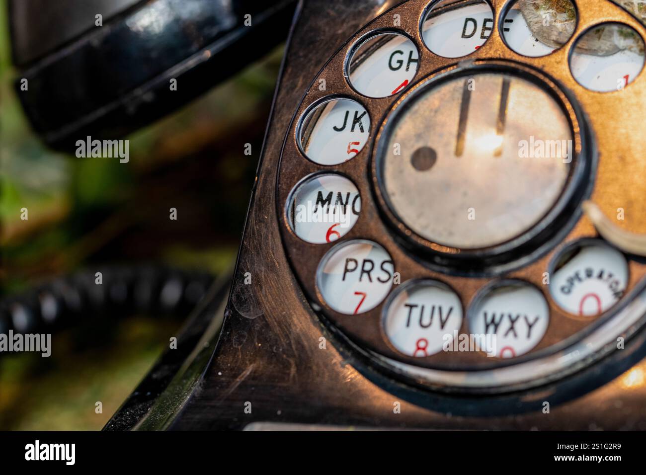 Old black rotary antique telephone close up Stock Photo - Alamy