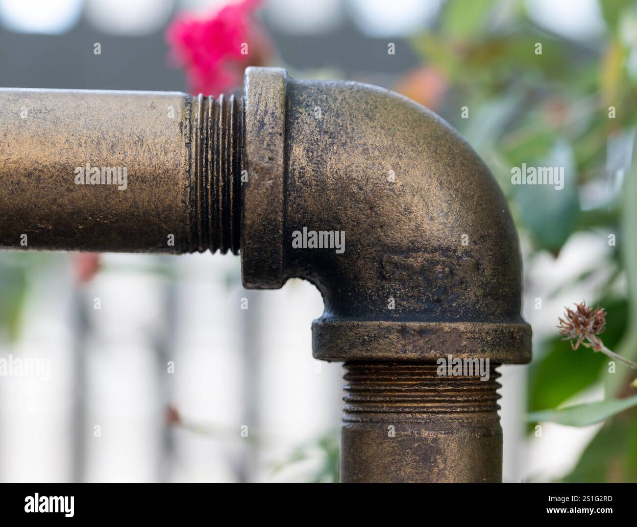 close up of metal water pipe threading elbow bend outdoors Stock Photo ...