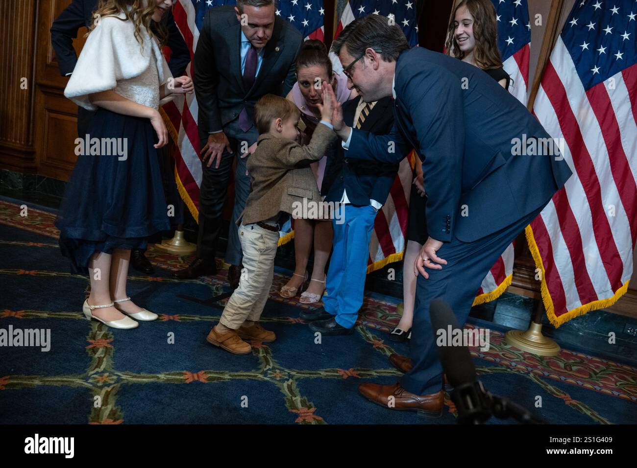 Washington, USA. 03rd Jan, 2025. A child with the family of United ...