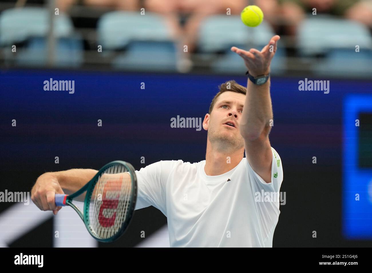 Poland's Hubert Hurkacz serves to Kazakhstan's Alexander Shevchenko ...