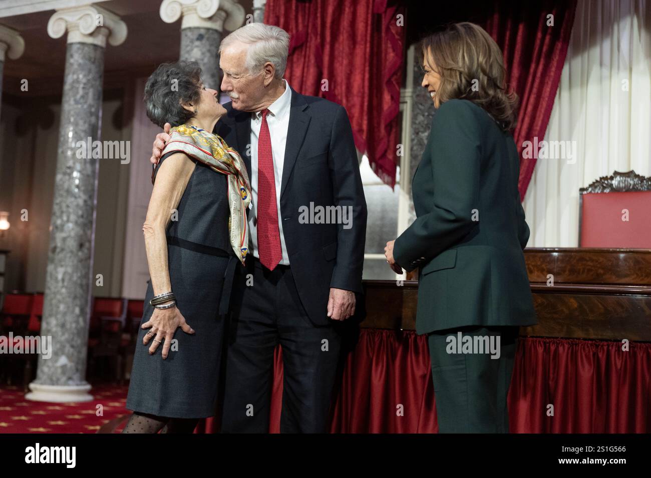 Sen. Angus King, I-Maine, center, kisses his spouse Mary Herman, left ...