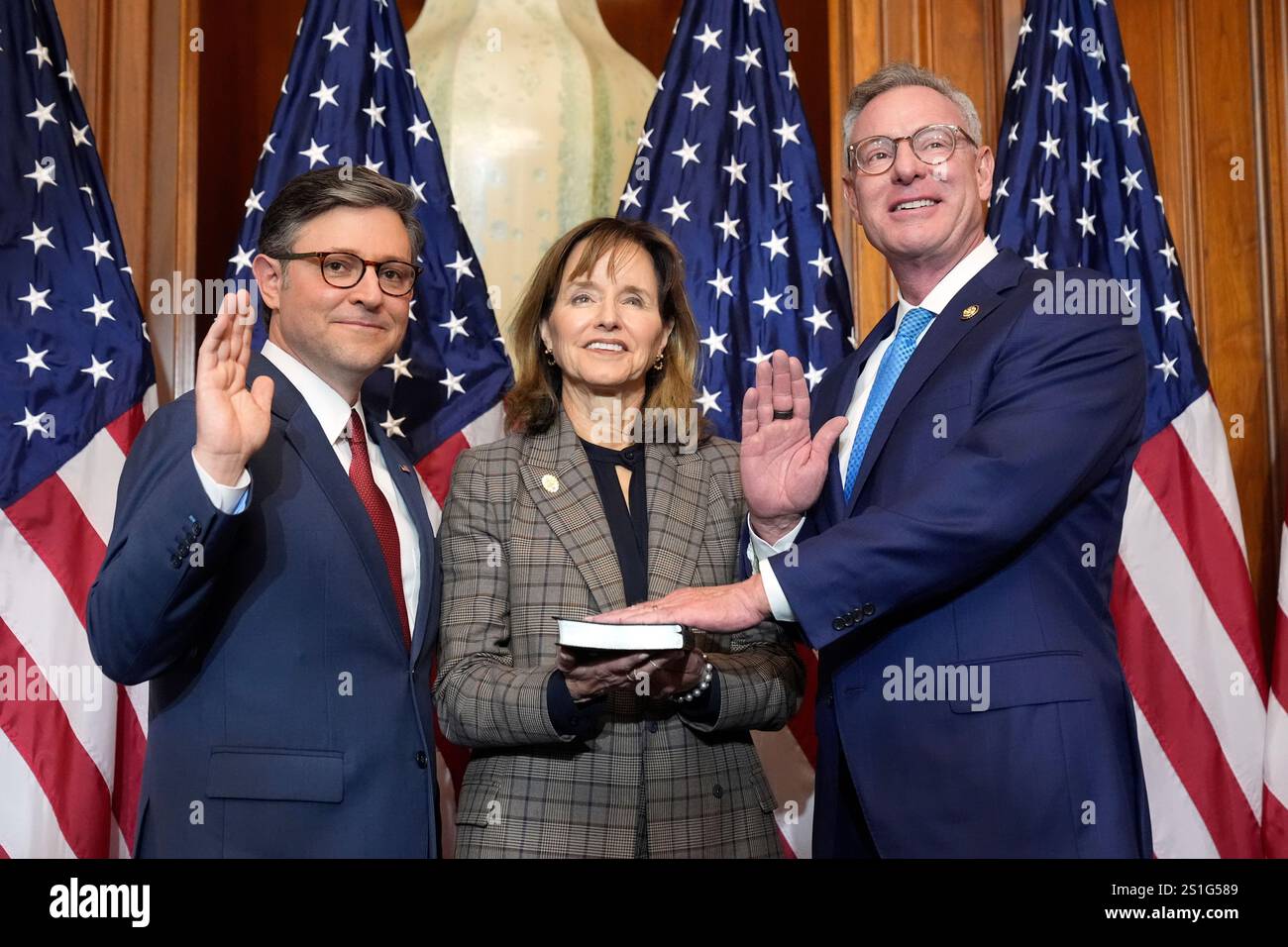 House Speaker Mike Johnson, R-La., left, poses during a ceremonial ...