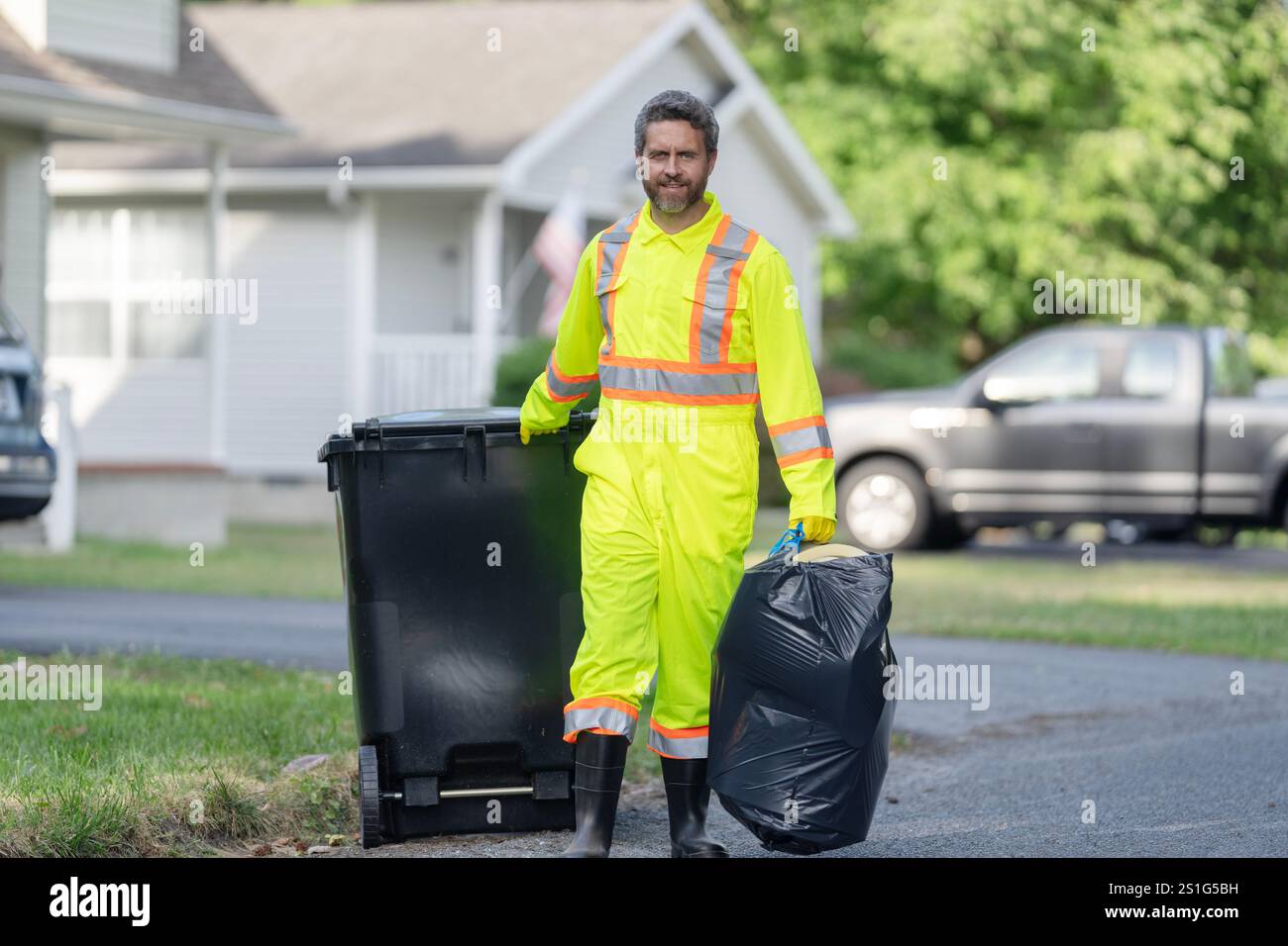 Picking up garbage plastic for cleaning. Keeping garbage plastic into ...