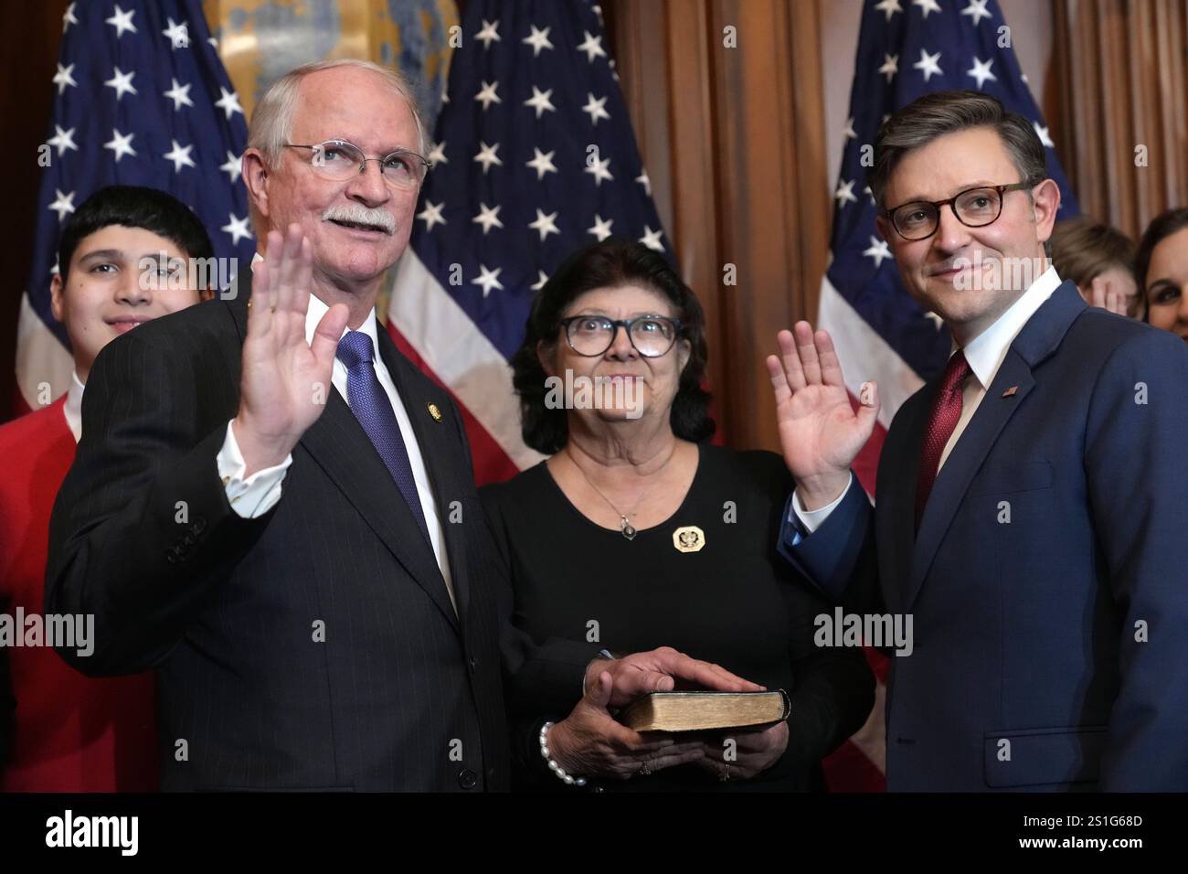 House Speaker Mike Johnson, R-La., right, poses during a ceremonial ...