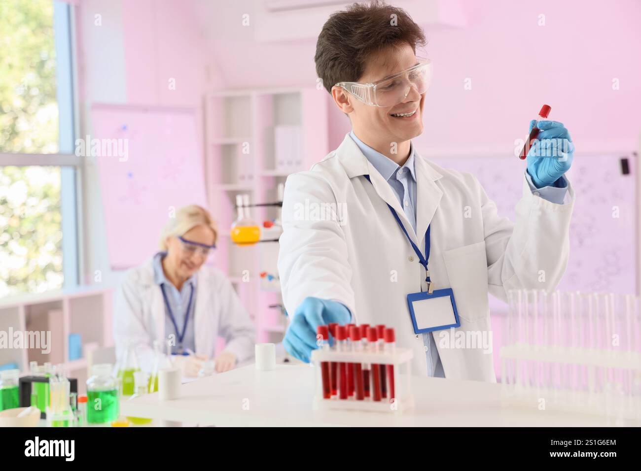 Tubes in laboratory chemical reactions hi-res stock photography and ...