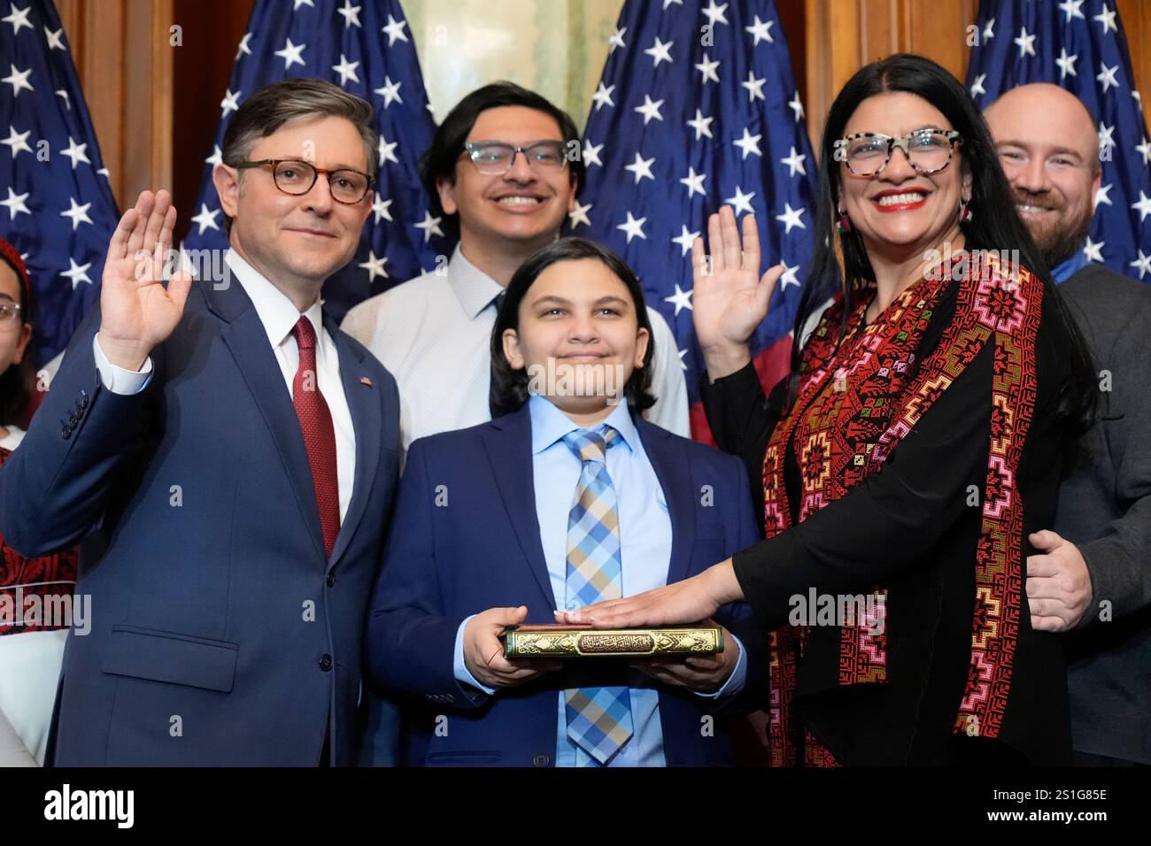 House Speaker Mike Johnson, R-La., left, poses during a ceremonial ...