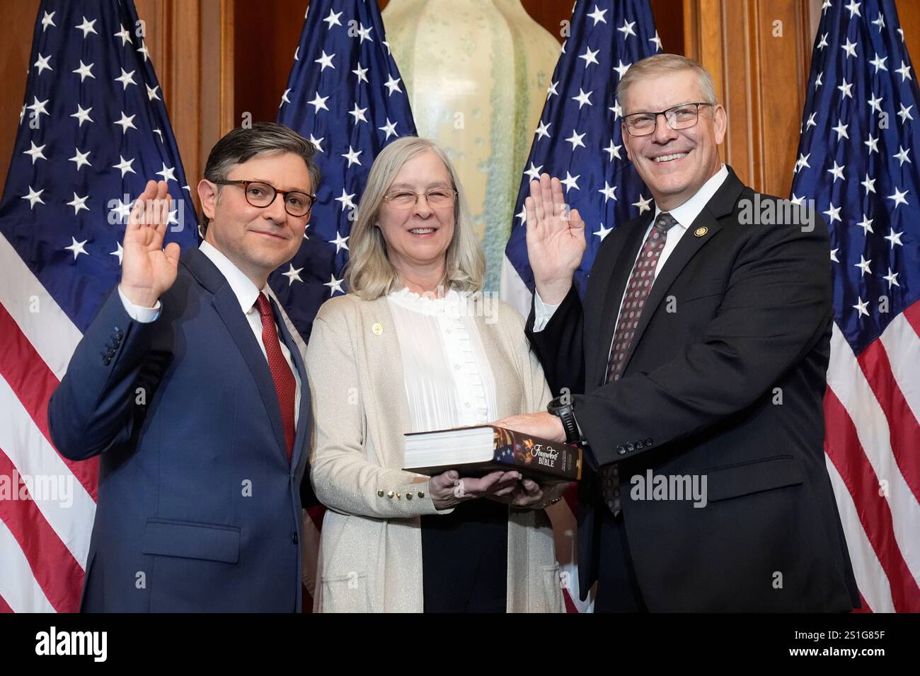 House Speaker Mike Johnson, R-La., left, poses during a ceremonial ...