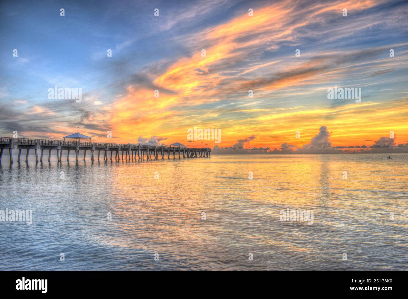 Juno Beach Pier Florida Flat Ocean Sunrise. With a Person on a Kayak ...