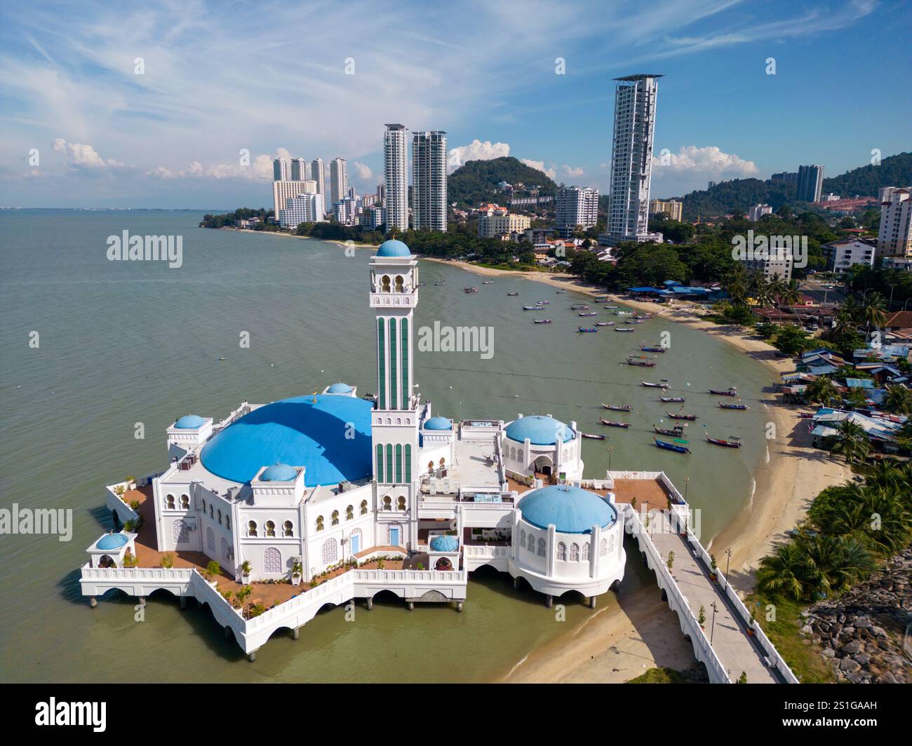 Drone aerial view of the Penang Floating Mosque or Masjid Terapung Pulau Pinang, also known as ...