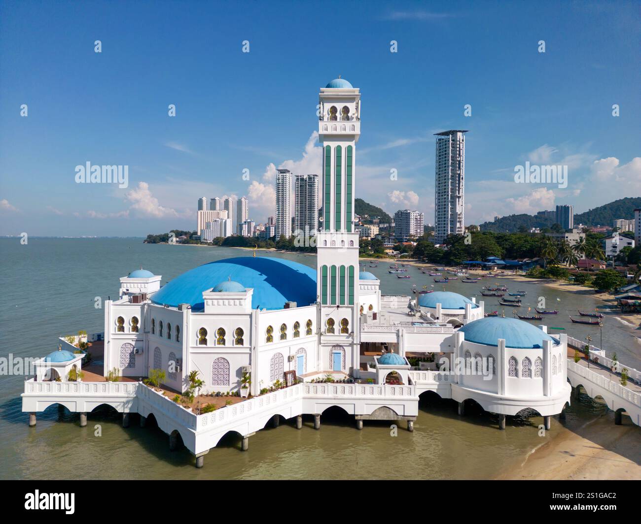 Drone aerial view of the Penang Floating Mosque or Masjid Terapung Pulau Pinang, also known as ...