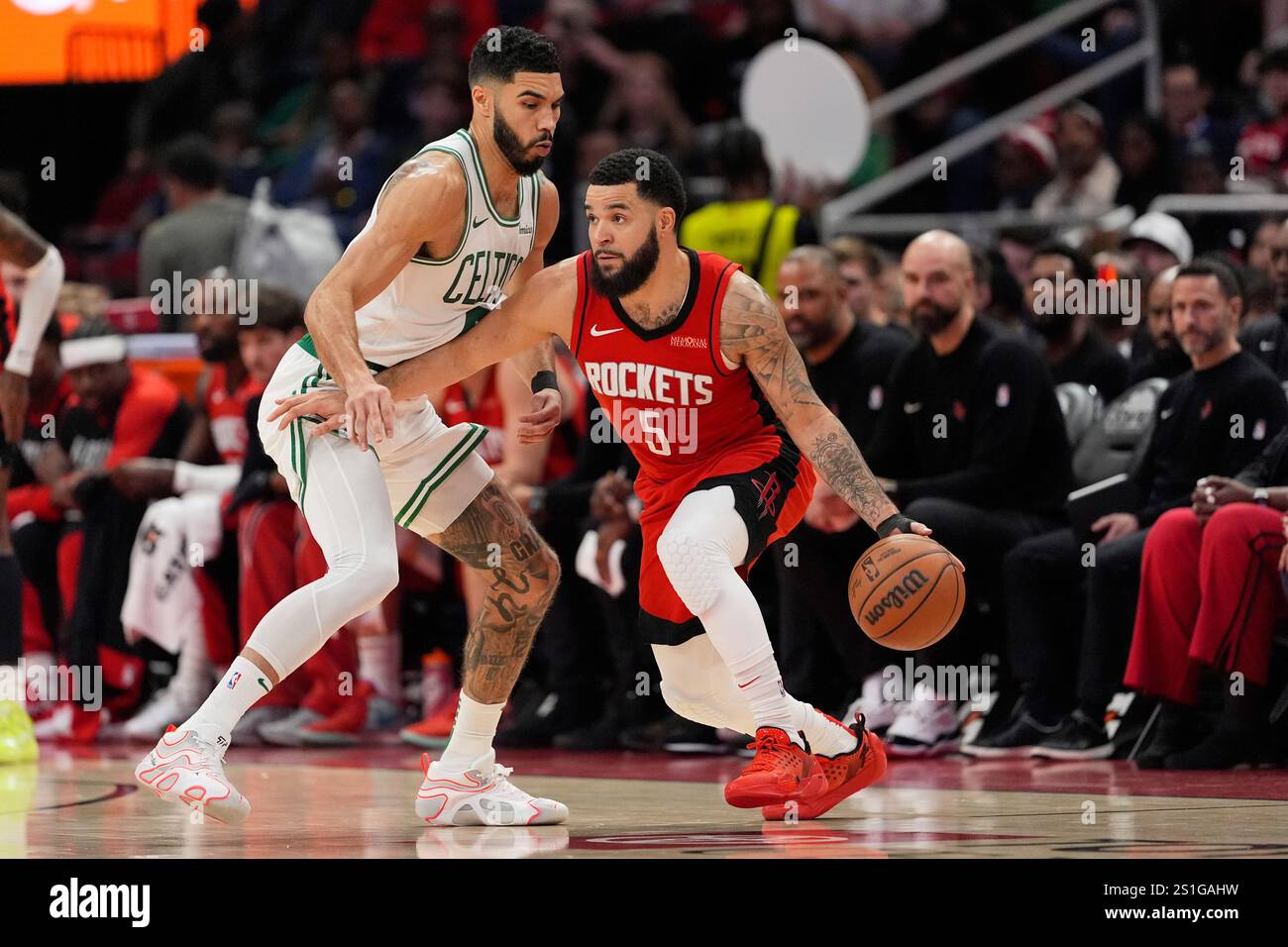 Boston Celtics' Jayson Tatum, left, defends against Houston Rockets ...