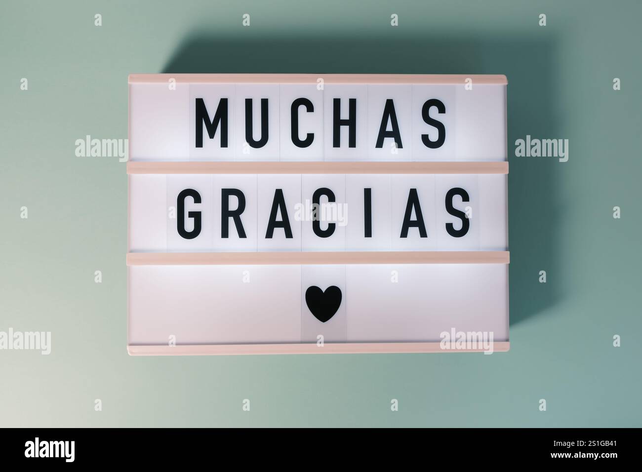 Thank you message on a lightbox with heart symbol Stock Photo - Alamy