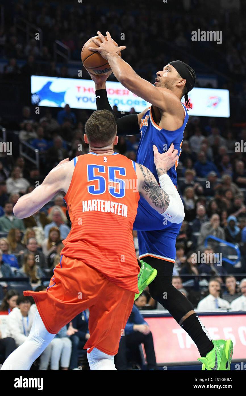 New York Kincks guard Josh Hart, right, looks to shoot over Oklahoma ...