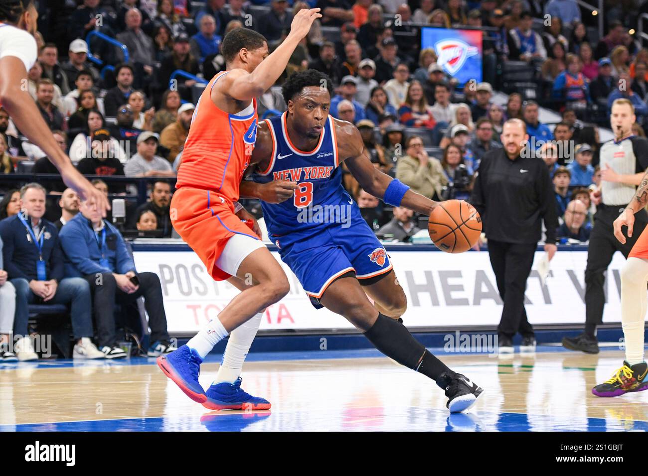 New York Kincks forward OG Anunoby, right, drives past Oklahoma City Thunder guard Aaron Wiggins ...