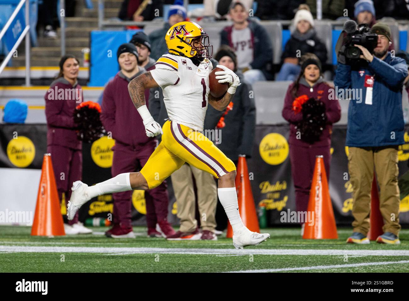 January 3, 2025: Minnesota running back Darius Taylor (1) runs in for a ...