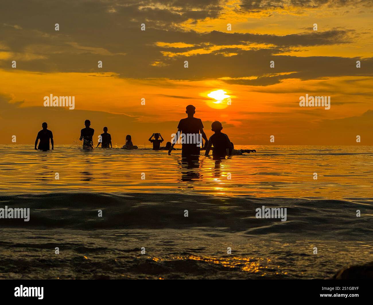 People silloute at beach Stock Photo - Alamy