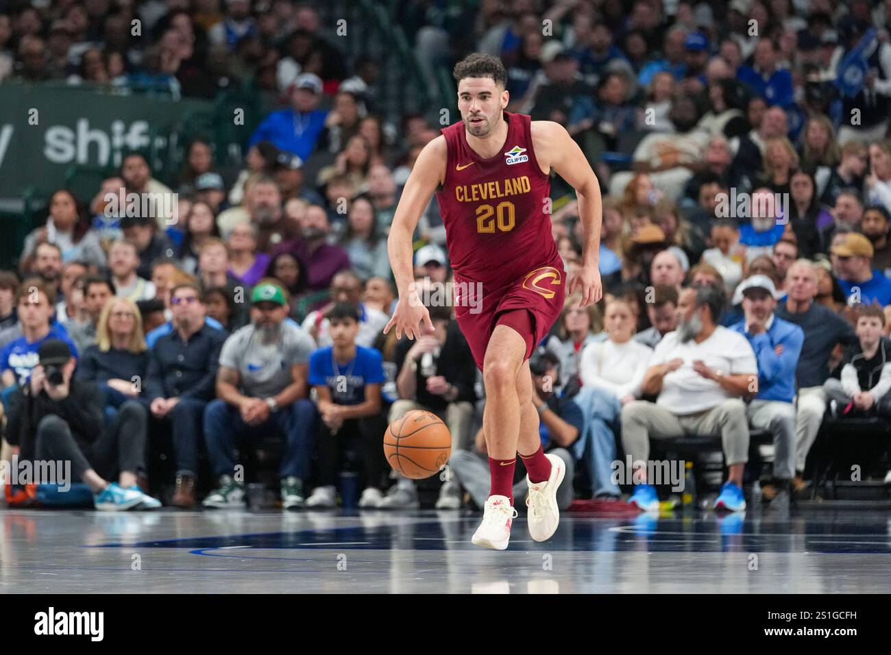 Cleveland Cavaliers forward Georges Niang dribbles the ball up court ...