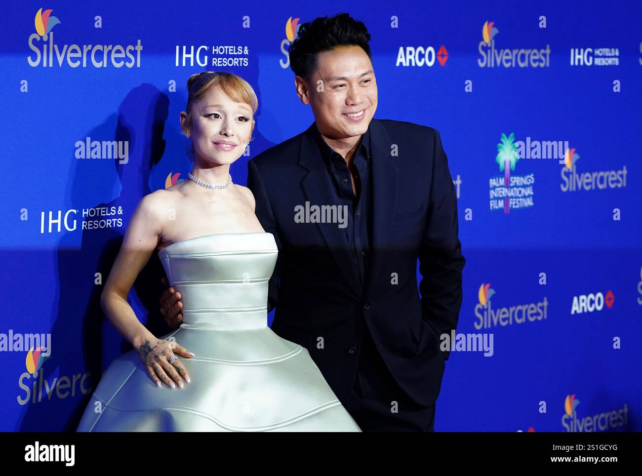 Ariana Grande, left, and Jon M. Chu arrive at the 36th annual Palm ...