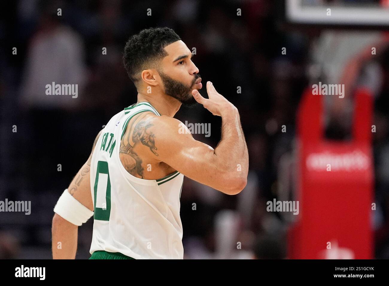 Boston Celtics' Jayson Tatum blows a kiss to the bench after making a 3 ...