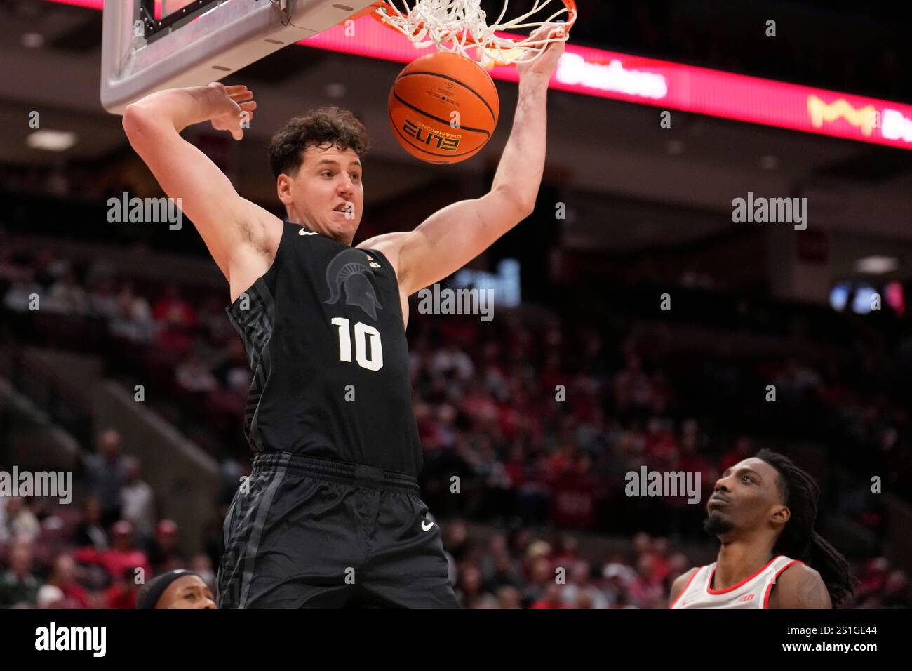 Michigan State center Szymon Zapala (10) dunks in front of Ohio State ...