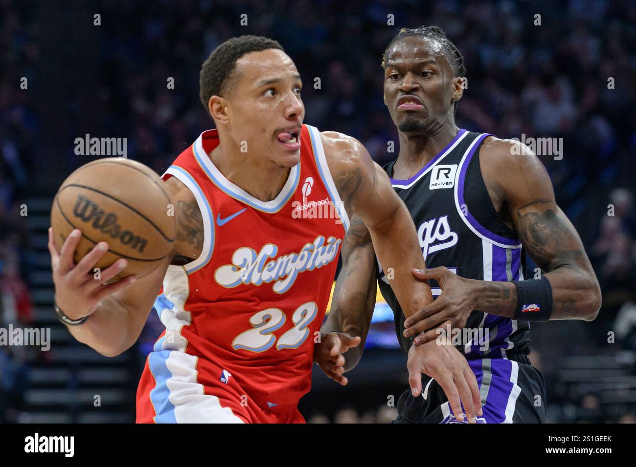 Memphis Grizzlies guard Desmond Bane (22) drives past Sacramento Kings ...